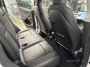 White Tesla Model Y 2021 in Tallinn, with an engine capacity of 0.00 L and mileage of 72 thousand km for 33000 €, photo 18 on AUTOMOTO.COM.LV