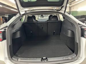 White Tesla Model Y 2021 in Tallinn, with an engine capacity of 0.00 L and mileage of 72 thousand km for 33000 €, photo 19 on AUTOMOTO.COM.LV