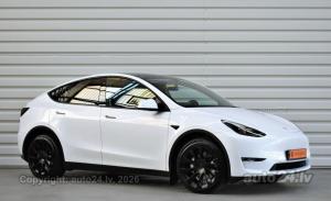 White Tesla Model Y 2022 in Tallinn, with an engine capacity of 0.00 L and mileage of 38 thousand km for 37400 €, photo 4 on AUTOMOTO.COM.LV
