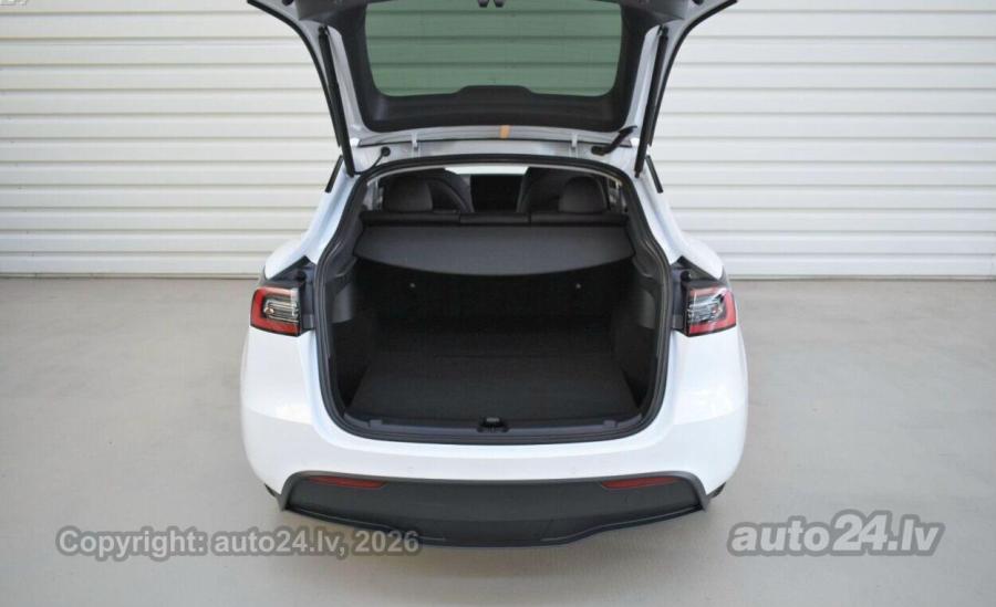 White Tesla Model Y 2022 in Tallinn, with an engine capacity of 0.00 L and mileage of 38 thousand km for 37400 €, photo 6 on AUTOMOTO.COM.LV