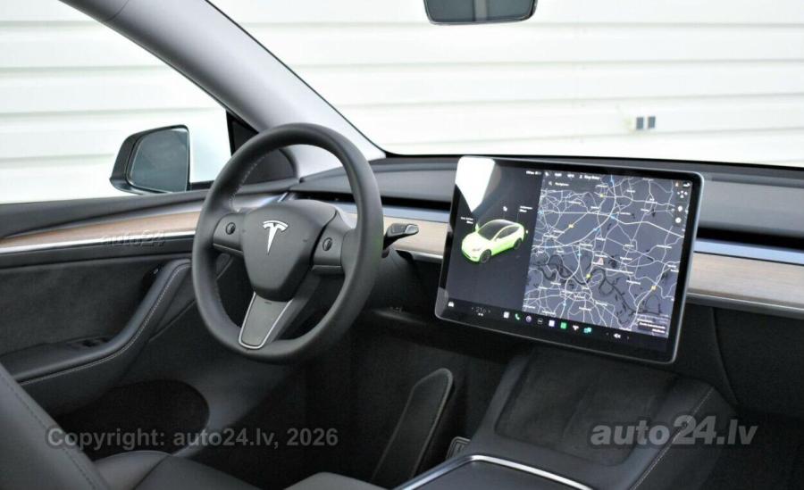 White Tesla Model Y 2022 in Tallinn, with an engine capacity of 0.00 L and mileage of 38 thousand km for 37400 €, photo 9 on AUTOMOTO.COM.LV
