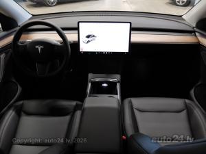 White Tesla Model Y 2022 in Tallinn, with an engine capacity of 0.00 L and mileage of 41 thousand km for 45900 €, photo 7 on AUTOMOTO.COM.LV