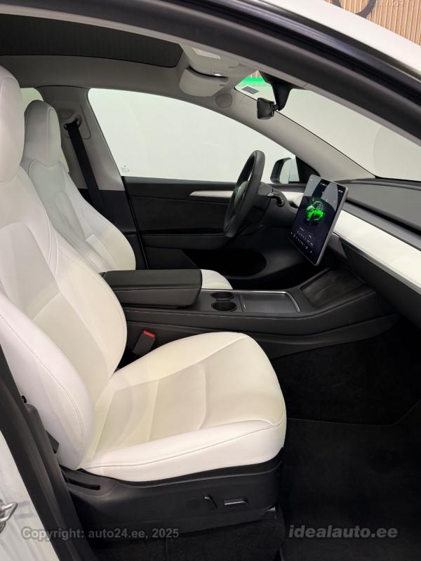 Balts Tesla Model Y 2023 Tallina, ar dzinēja tilpumu 0.00 L un nobraukumu 70 tūkst. km par 37990 €, foto 10 vietnē AUTOMOTO.COM.LV