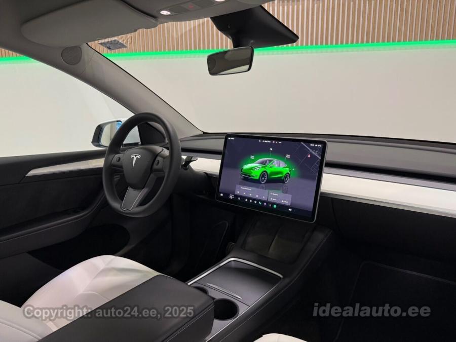 Белый Тесла Модель Y 2023 в Таллин, объемом двигателя 0.00 л и пробегом 70 тыс. км за 37990 €, фото 13 на AUTOMOTO.COM.LV