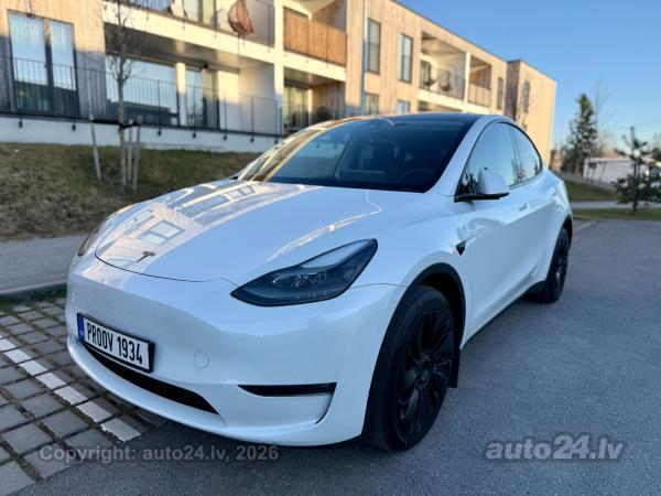 White Tesla Model Y 2023 in Tallinn, with an engine capacity of 0.00 L and mileage of 94 thousand km for 33900 €, photo 3 on AUTOMOTO.COM.LV