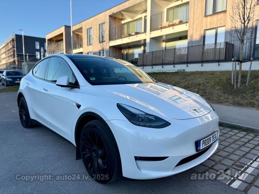 White Tesla Model Y 2023 in Tallinn, with an engine capacity of 0.00 L and mileage of 94 thousand km for 33900 €, photo 1 on AUTOMOTO.COM.LV