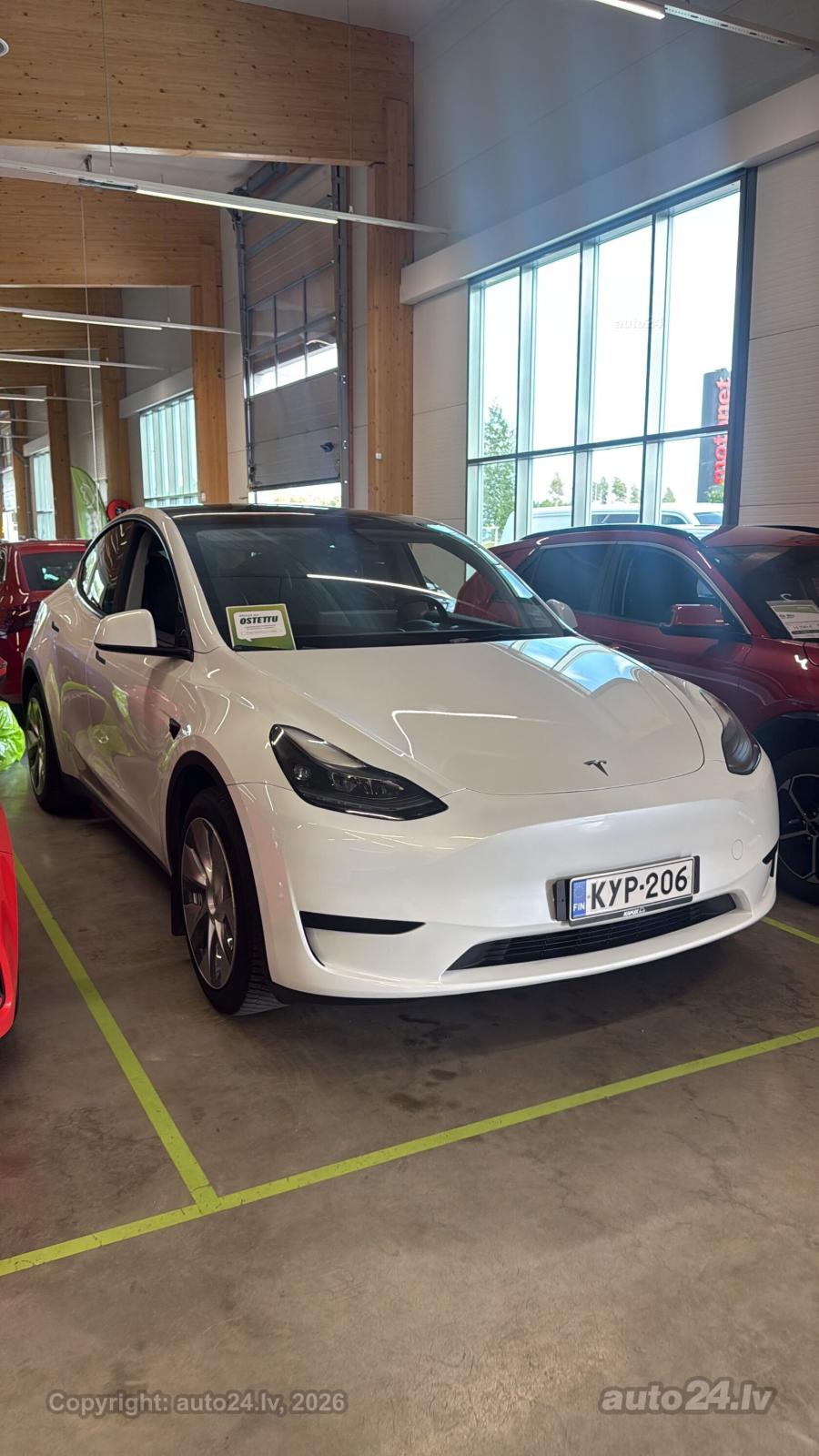White Tesla Model Y 2023 in Voru, with an engine capacity of 0.00 L and mileage of 59 thousand km for 33890 €, photo 4 on AUTOMOTO.COM.LV