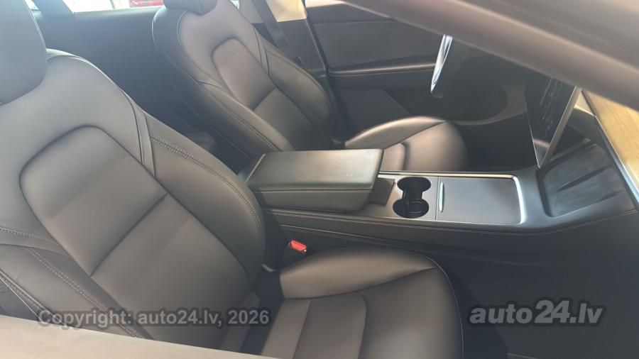 White Tesla Model Y 2023 in Voru, with an engine capacity of 0.00 L and mileage of 59 thousand km for 33890 €, photo 6 on AUTOMOTO.COM.LV