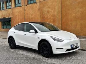 White Tesla Model Y 2023 in Tallinn, with an engine capacity of 0.00 L and mileage of 99 thousand km for 33700 €, photo  on AUTOMOTO.COM.LV