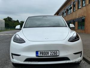 White Tesla Model Y 2023 in Tallinn, with an engine capacity of 0.00 L and mileage of 99 thousand km for 33700 €, photo 6 on AUTOMOTO.COM.LV