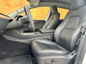 White Tesla Model Y 2023 in Tallinn, with an engine capacity of 0.00 L and mileage of 99 thousand km for 33700 €, photo 7 on AUTOMOTO.COM.LV