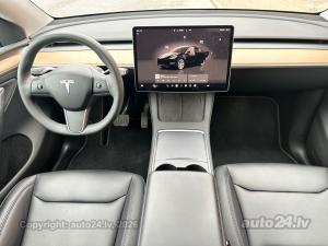 White Tesla Model Y 2023 in Tallinn, with an engine capacity of 0.00 L and mileage of 99 thousand km for 33700 €, photo 10 on AUTOMOTO.COM.LV