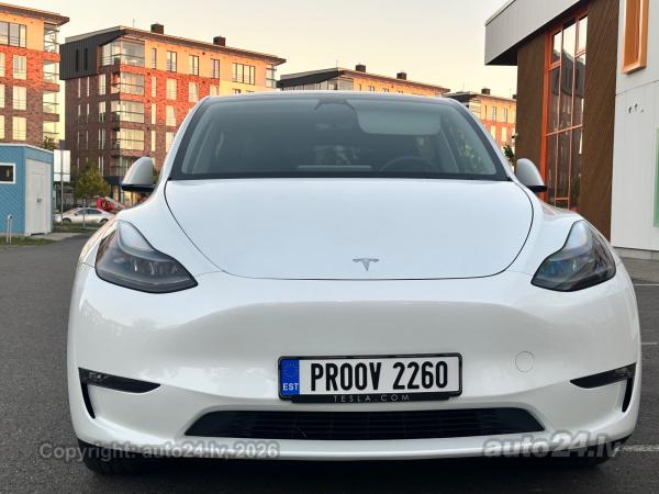 White Tesla Model Y 2023 in Tallinn, with an engine capacity of 0.00 L and mileage of 169 thousand km for 25900 €, photo 6 on AUTOMOTO.COM.LV