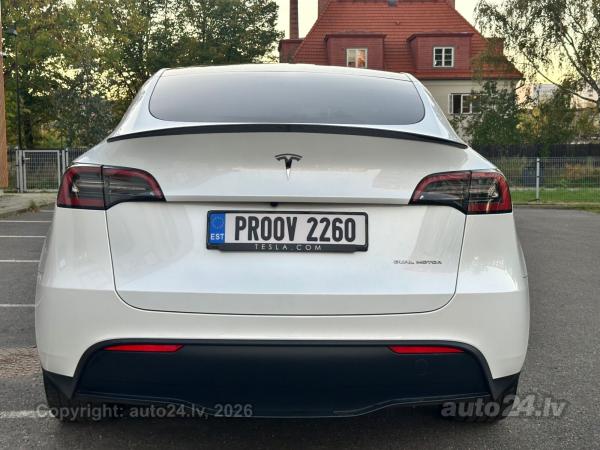 White Tesla Model Y 2023 in Tallinn, with an engine capacity of 0.00 L and mileage of 169 thousand km for 25900 €, photo 7 on AUTOMOTO.COM.LV