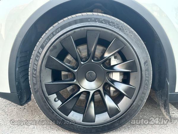White Tesla Model Y 2023 in Tallinn, with an engine capacity of 0.00 L and mileage of 169 thousand km for 25900 €, photo 10 on AUTOMOTO.COM.LV