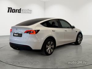 White Tesla Model Y 2024 in Tallinn, with an engine capacity of 0.00 L and mileage of 68 thousand km for 39900 €, photo 3 on AUTOMOTO.COM.LV
