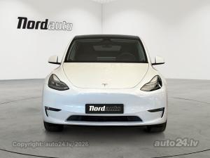 White Tesla Model Y 2024 in Tallinn, with an engine capacity of 0.00 L and mileage of 68 thousand km for 39900 €, photo 4 on AUTOMOTO.COM.LV