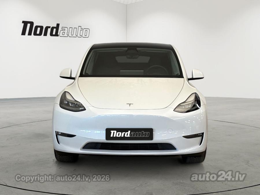 White Tesla Model Y 2024 in Tallinn, with an engine capacity of 0.00 L and mileage of 68 thousand km for 39900 €, photo 4 on AUTOMOTO.COM.LV