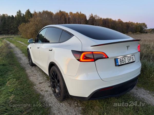 White Tesla Model Y 2024 in Tallinn, with an engine capacity of 0.00 L and mileage of 28 thousand km for 43500 €, photo 6 on AUTOMOTO.COM.LV