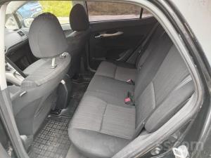 Black Toyota Auris 2008 in Jelgava, with an engine capacity of 2.00 L and mileage of 255 thousand km for 2100 €, photo 7 on AUTOMOTO.COM.LV