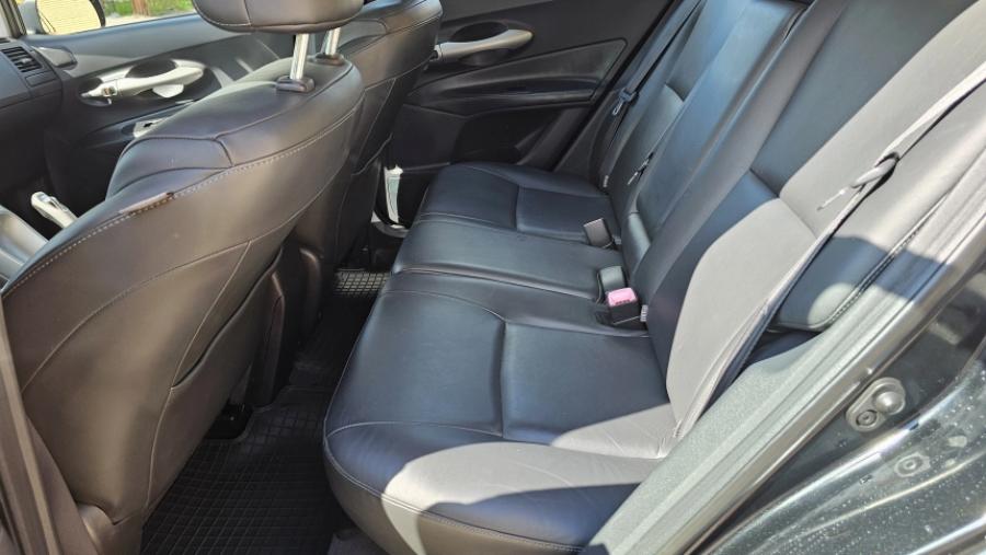 Black Toyota Auris 2008 in Riga, with an engine capacity of 2.20 L and mileage of 365 thousand km for 3350 €, photo 11 on AUTOMOTO.COM.LV