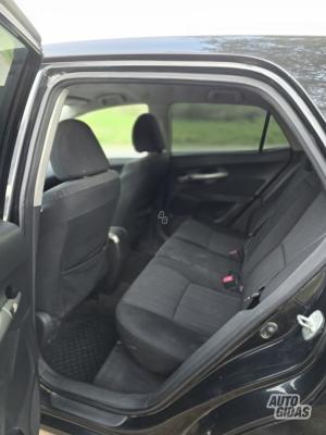 Black Toyota Auris 2009 in Plunge, with an engine capacity of 2.00 L and mileage of 285 thousand km for 1900 €, photo 11 on AUTOMOTO.COM.LV