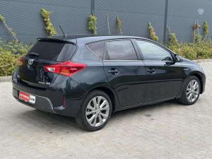 Black Toyota Auris 2014 in Vilnius, with an engine capacity of 1.80 L and mileage of 277 thousand km for 7878 €, photo 6 on AUTOMOTO.COM.LV