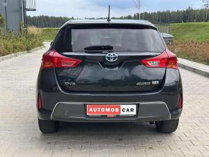 Black Toyota Auris 2014 in Vilnius, with an engine capacity of 1.80 L and mileage of 277 thousand km for 7878 €, photo 8 on AUTOMOTO.COM.LV