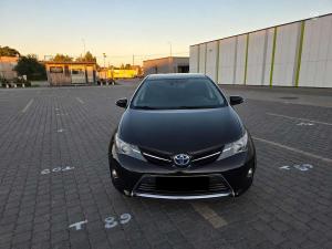 Black Toyota Auris 2015 in Vilnius, with an engine capacity of 1.80 L and mileage of 186 thousand km for 8800 €, photo 3 on AUTOMOTO.COM.LV