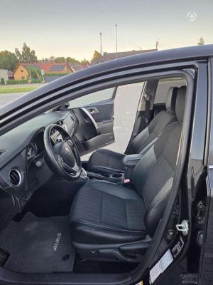 Black Toyota Auris 2015 in Vilnius, with an engine capacity of 1.80 L and mileage of 186 thousand km for 8800 €, photo 14 on AUTOMOTO.COM.LV