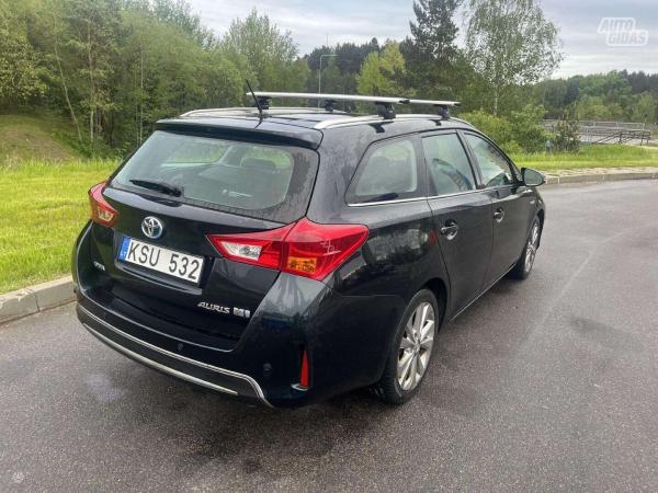 Black Toyota Auris 2013 in Vilnius, with an engine capacity of 1.80 L and mileage of 219 thousand km for 8200 €, photo 6 on AUTOMOTO.COM.LV