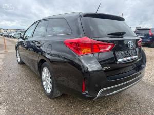 Black Toyota Auris 2014 in Vilnius, with an engine capacity of 1.80 L and mileage of 235 thousand km for 9850 €, photo 4 on AUTOMOTO.COM.LV