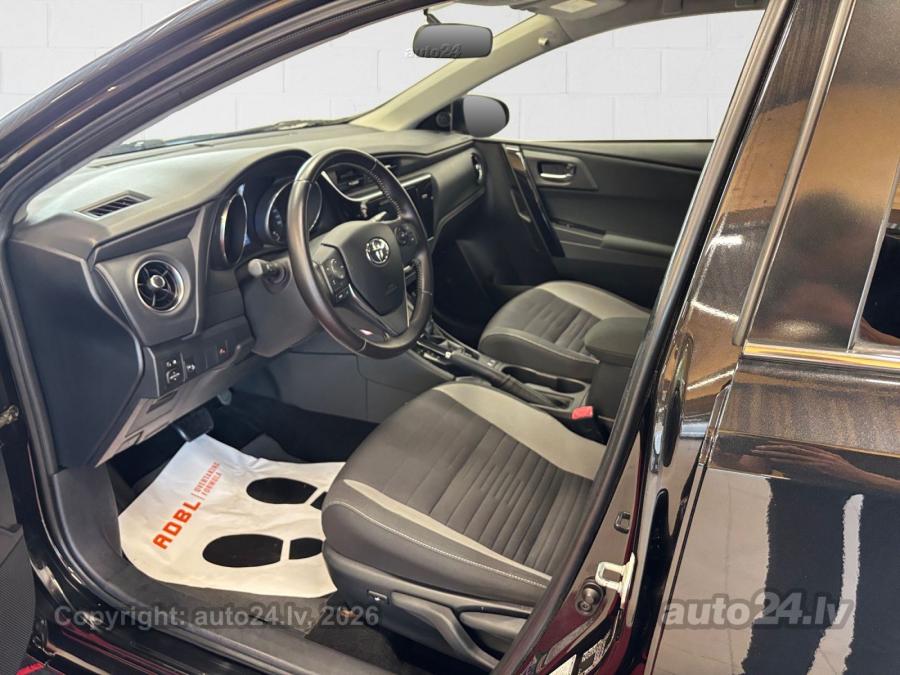 Black Toyota Auris 2016 in Tartu, with an engine capacity of 1.20 L and mileage of 141 thousand km for 10490 €, photo 12 on AUTOMOTO.COM.LV