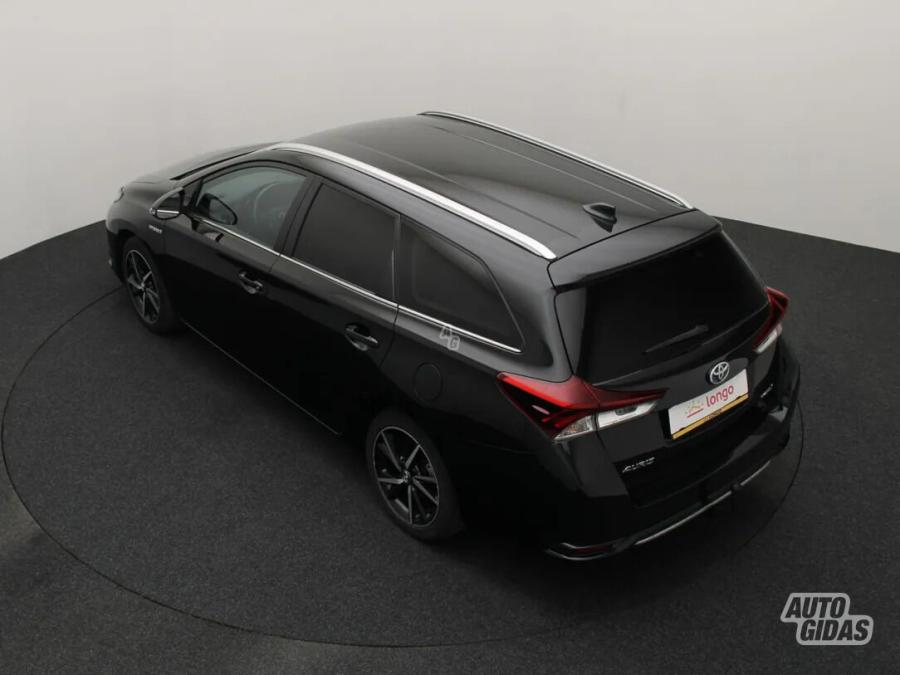 Black Toyota Auris 2019 in Vilnius, with an engine capacity of 1.80 L and mileage of 201 thousand km for 13699 €, photo 12 on AUTOMOTO.COM.LV
