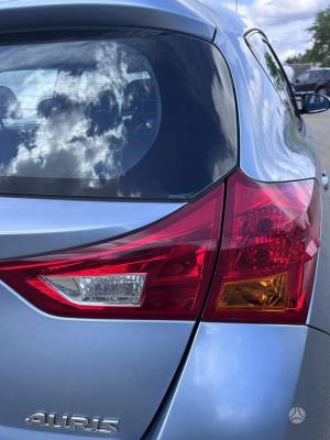 Blue Toyota Auris 2013 in Ukmerge, with an engine capacity of 1.60 L and mileage of 207 thousand km for 7999 €, photo 24 on AUTOMOTO.COM.LV