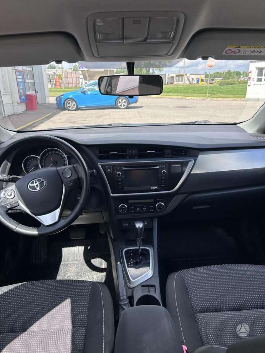 Blue Toyota Auris 2013 in Ukmerge, with an engine capacity of 1.60 L and mileage of 207 thousand km for 7999 €, photo 42 on AUTOMOTO.COM.LV