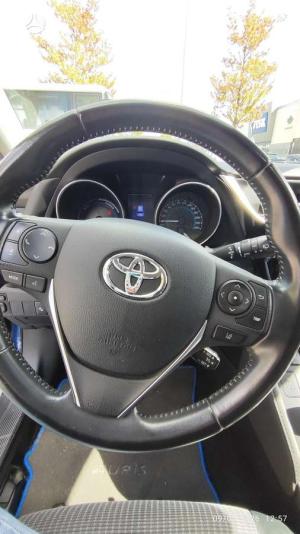 Blue Toyota Auris 2016 in Klaipeda, with an engine capacity of 1.80 L and mileage of 135 thousand km for 13900 €, photo 17 on AUTOMOTO.COM.LV