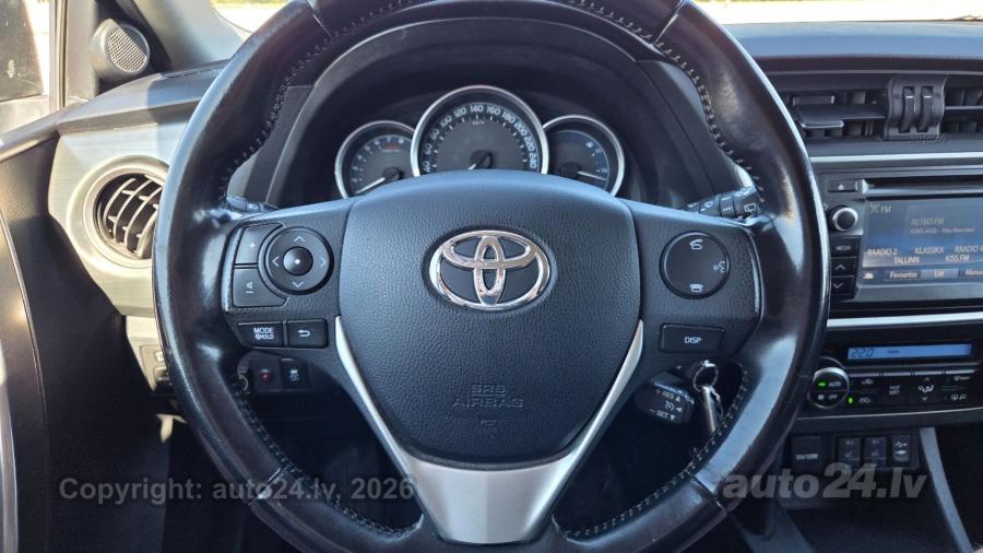 Blue Toyota Auris 2014 in Tallinn, with an engine capacity of 1.60 L and mileage of 234 thousand km for 5990 €, photo 13 on AUTOMOTO.COM.LV