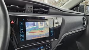 Blue Toyota Auris 2015 in Riga, with an engine capacity of 1.60 L and mileage of 257 thousand km for 7990 €, photo 21 on AUTOMOTO.COM.LV