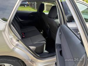 Brown Toyota Auris 2013 in Parnu, with an engine capacity of 1.60 L and mileage of 0 thousand km for 6450 €, photo 15 on AUTOMOTO.COM.LV