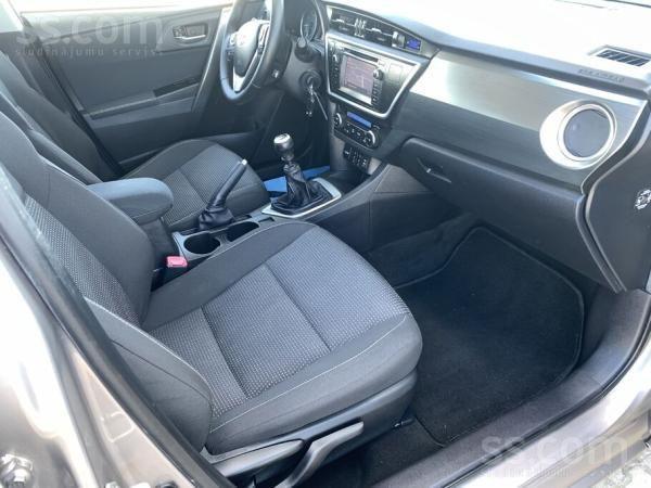 Brown Toyota Auris 2013 in Ogre, with an engine capacity of 1.30 L and mileage of 213 thousand km for 6470 €, photo 10 on AUTOMOTO.COM.LV