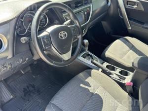 Brown Toyota Auris 2014 in Riga, with an engine capacity of 1.60 L and mileage of 180 thousand km for 7999 €, photo 13 on AUTOMOTO.COM.LV
