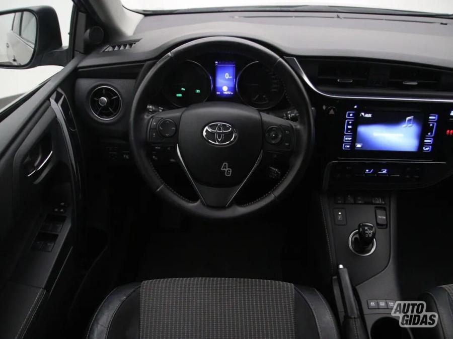 Brown Toyota Auris 2015 in Vilnius, with an engine capacity of 1.80 L and mileage of 149 thousand km for 12199 €, photo 18 on AUTOMOTO.COM.LV