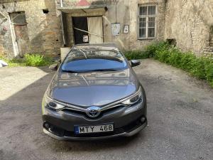 Brown Toyota Auris 2016 in Vilnius, with an engine capacity of 1.80 L and mileage of 62 thousand km for 14999 €, photo 4 on AUTOMOTO.COM.LV