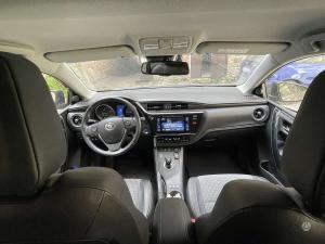 Brown Toyota Auris 2016 in Vilnius, with an engine capacity of 1.80 L and mileage of 62 thousand km for 14999 €, photo 14 on AUTOMOTO.COM.LV