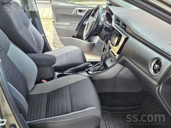 Brown Toyota Auris 2018 in Riga, with an engine capacity of 1.20 L and mileage of 119 thousand km for 9900 €, photo 10 on AUTOMOTO.COM.LV