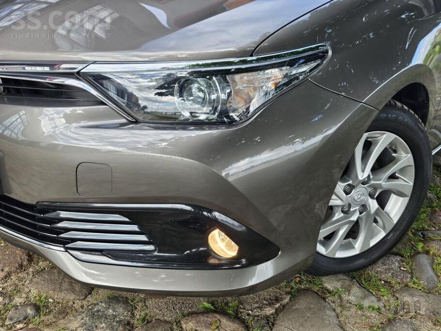 Brūns Toyota Auris 2018 Rīga, ar dzinēja tilpumu 1.20 L un nobraukumu 119 tūkst. km par 9900 €, foto 29 vietnē AUTOMOTO.COM.LV