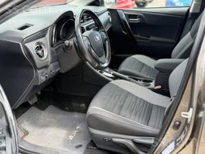 Brown Toyota Auris 2018 in Riga, with an engine capacity of 1.60 L and mileage of 229 thousand km for 9900 €, photo 13 on AUTOMOTO.COM.LV