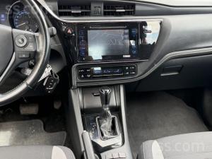 Brown Toyota Auris 2018 in Riga, with an engine capacity of 1.60 L and mileage of 229 thousand km for 9900 €, photo 16 on AUTOMOTO.COM.LV