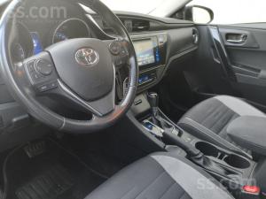 Brown Toyota Auris 2019 in Riga, with an engine capacity of 1.60 L and mileage of 122 thousand km for 12900 €, photo 14 on AUTOMOTO.COM.LV